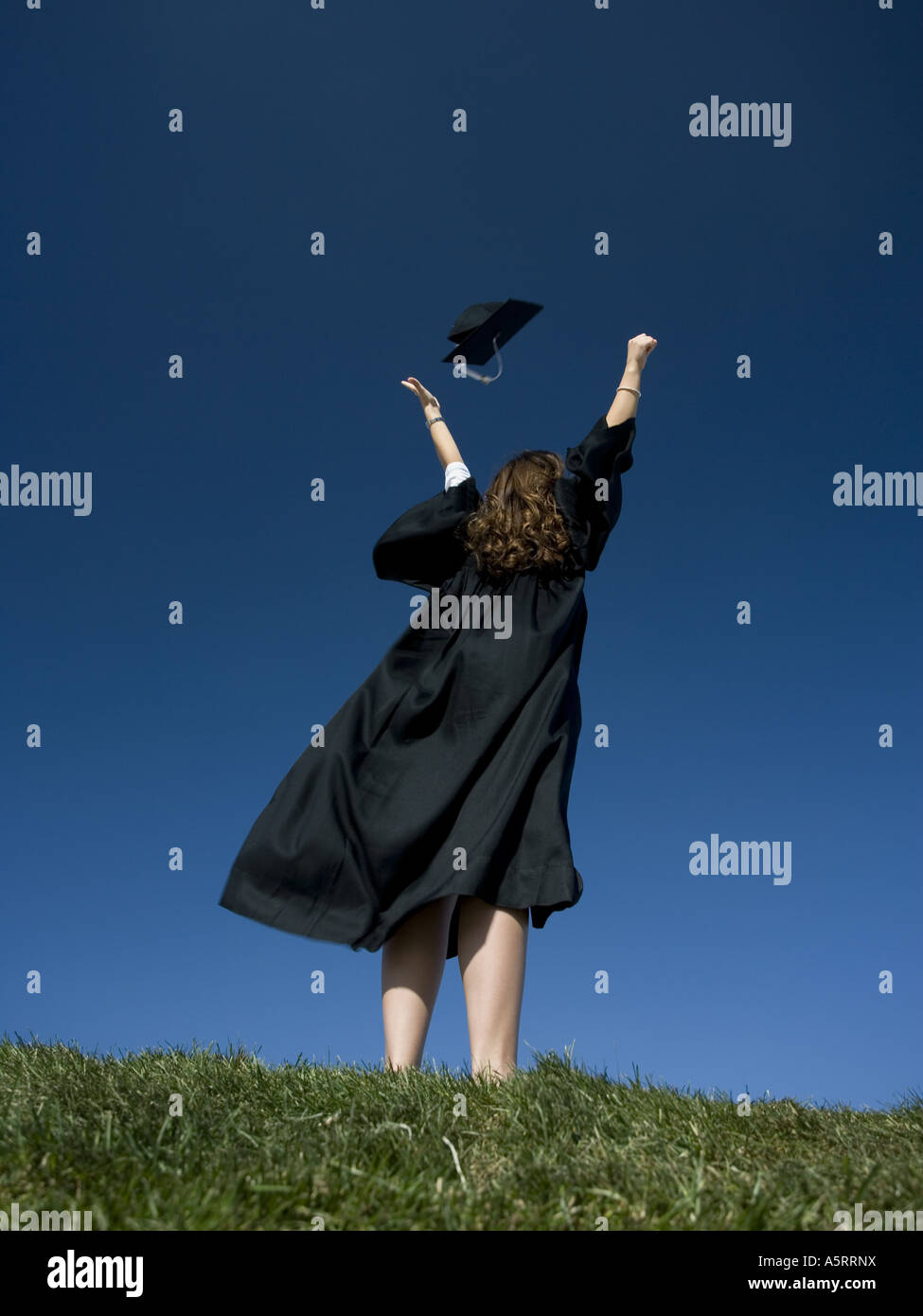 Female student celebrating graduation Stock Photo - Alamy