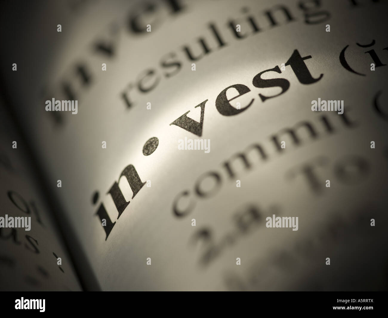Dictionary definition of invest Stock Photo - Alamy