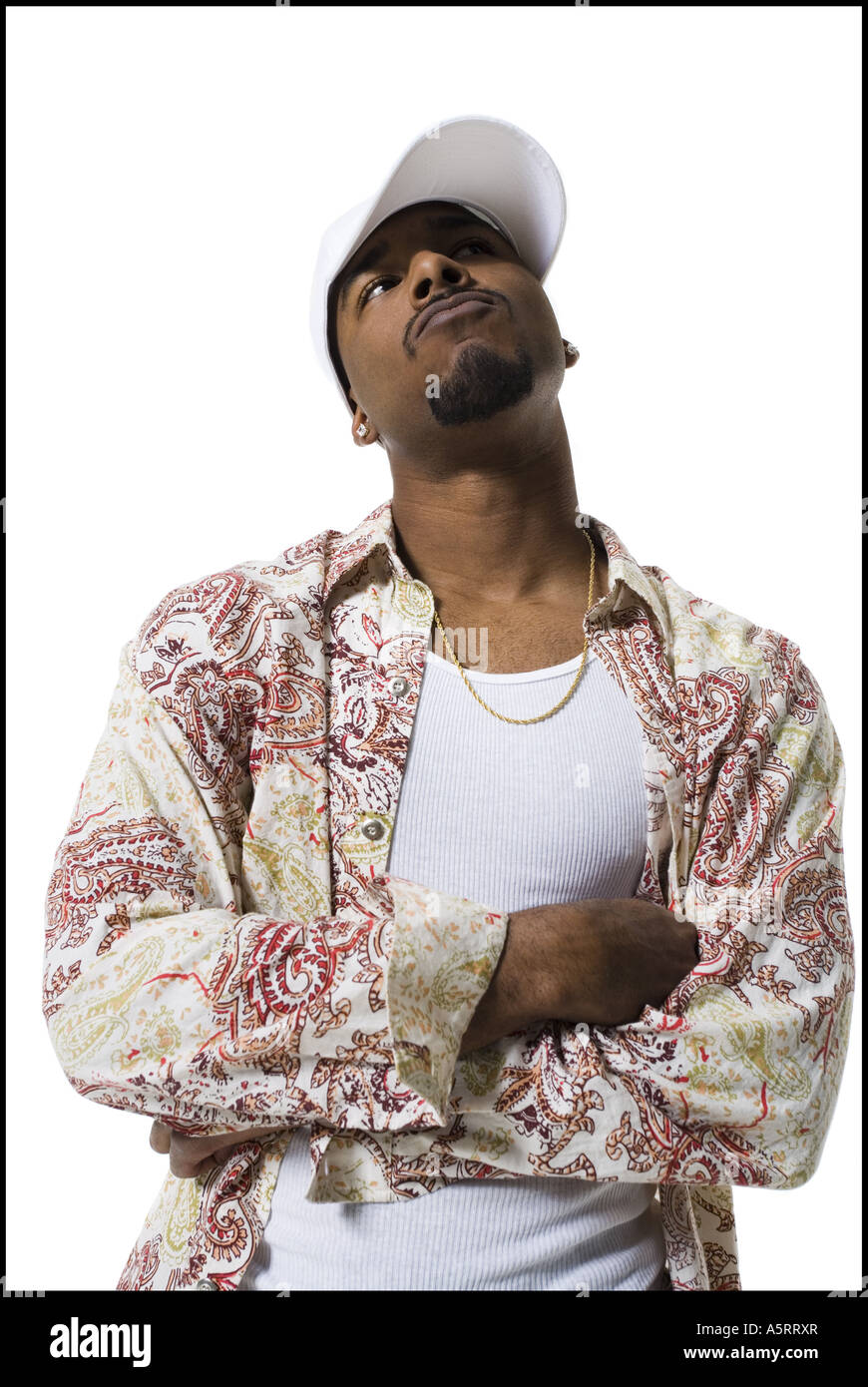 African American thinking with arms folded Stock Photo - Alamy