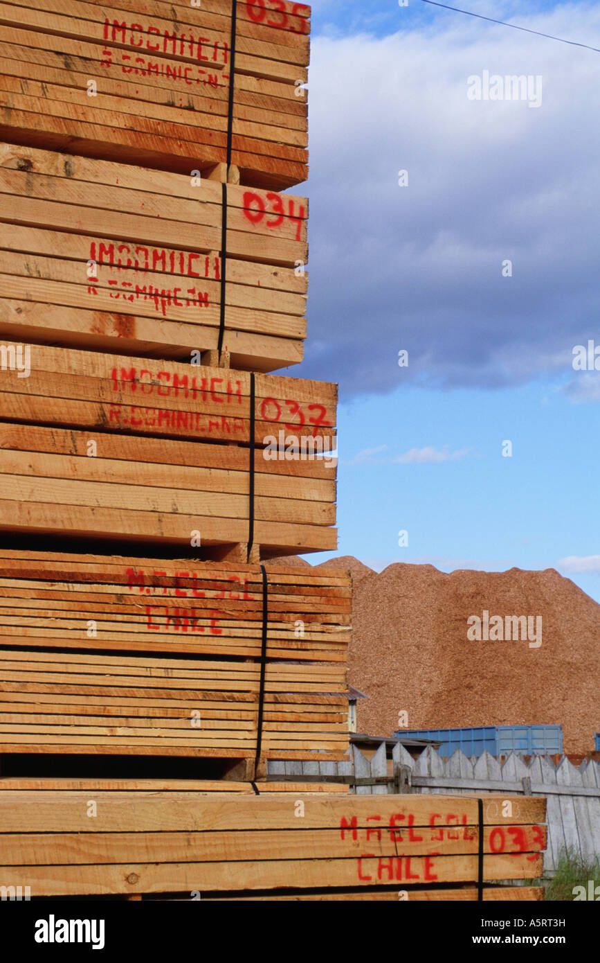 Lumber and a mountain of woodchips bound for Japan Puerto Montt Chile ...