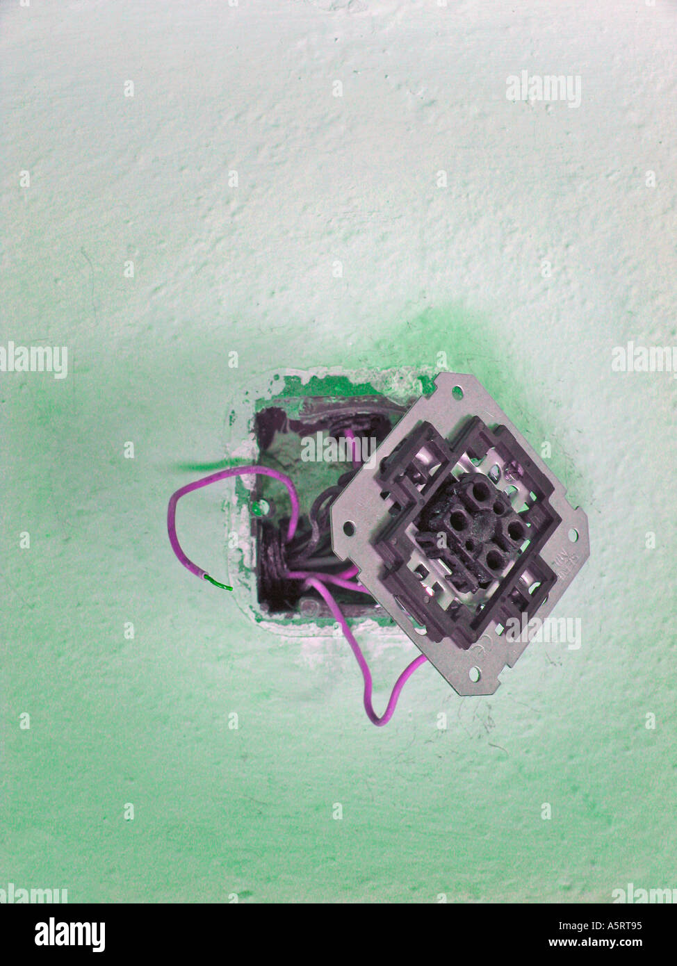 Unseated electrical switch in wall Stock Photo - Alamy