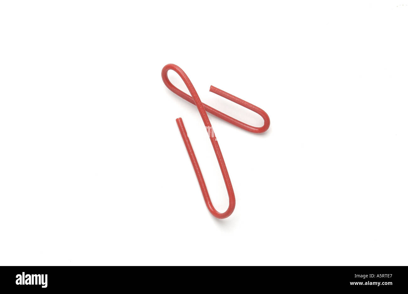 Coloured bent paper clip Stock Photo - Alamy