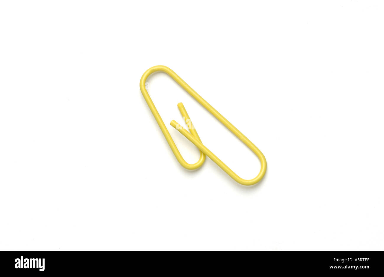 Coloured bent paper clip Stock Photo - Alamy