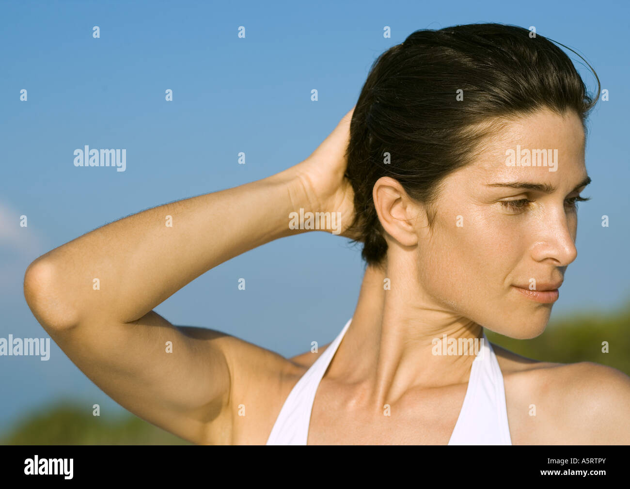 Woman holds up hands behind hi-res stock photography and images - Alamy