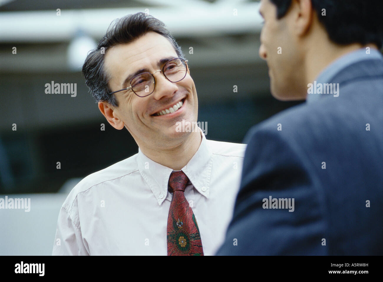 Two heads talking to each other hi-res stock photography and images - Alamy