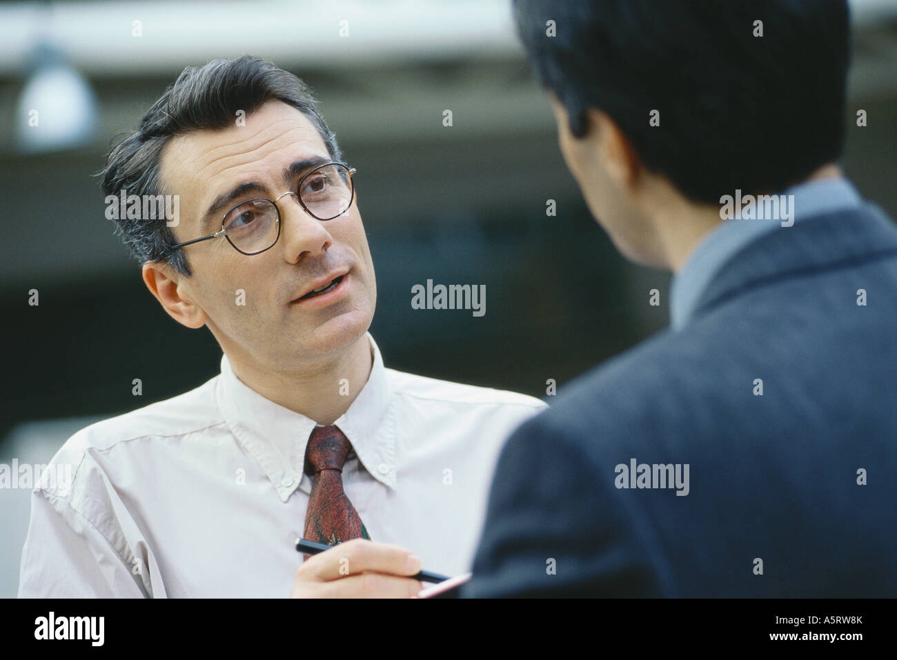 Two Heads Talking To Each Other High Resolution Stock Photography and ...