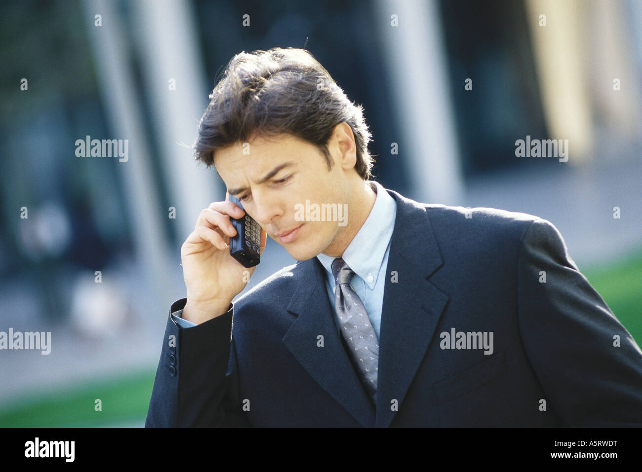 Businessman using phone Stock Photo - Alamy