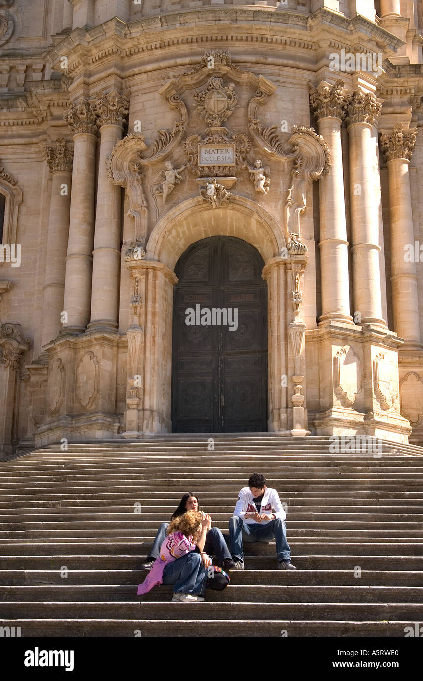 On the stairs in front of the Cathedral of San Giorgio main portal ...
