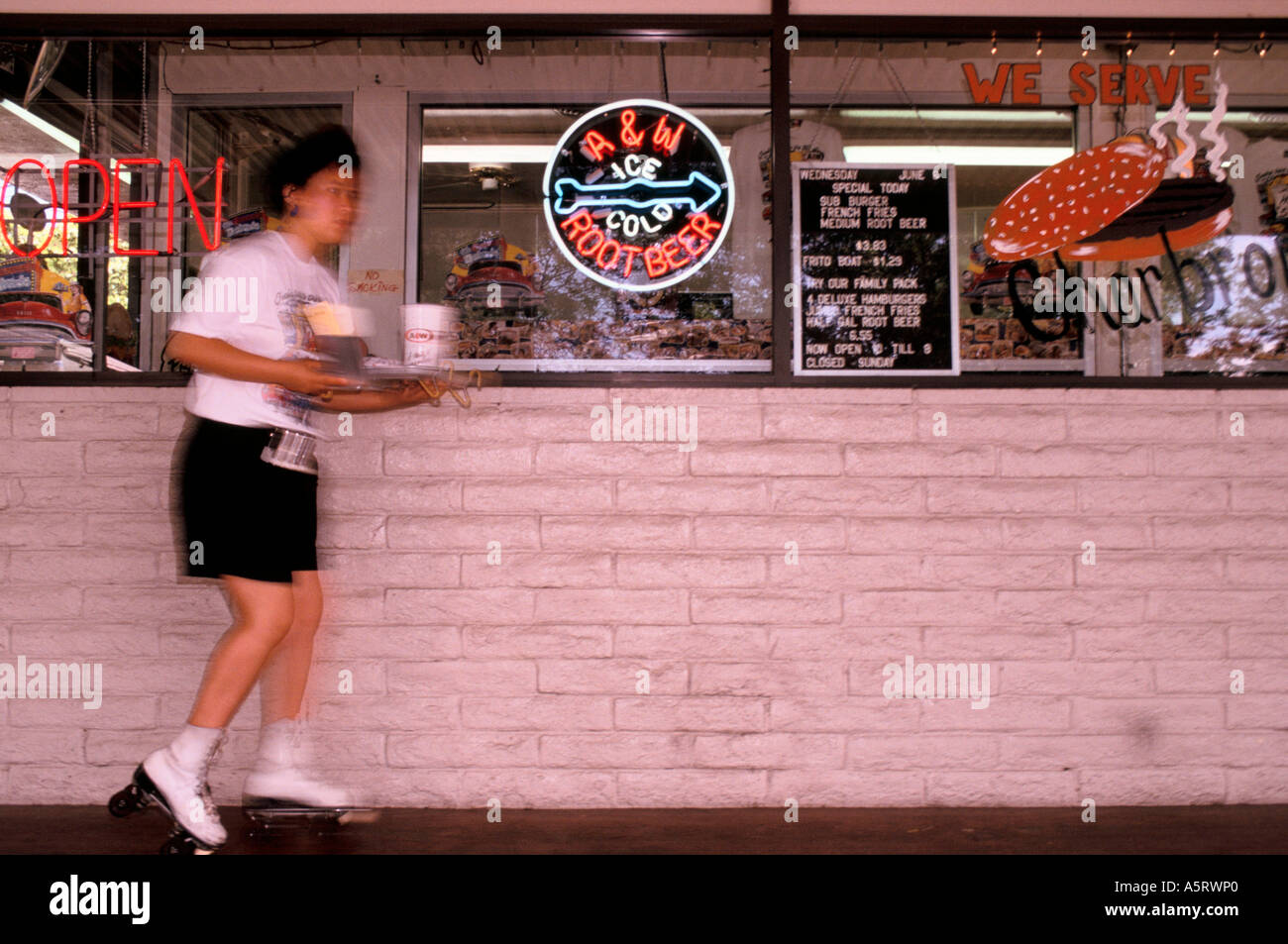 WAITRESS ON ROLLER SKATES AT DRIVE IN RESTAURANT MODESTO Stock Photo ...
