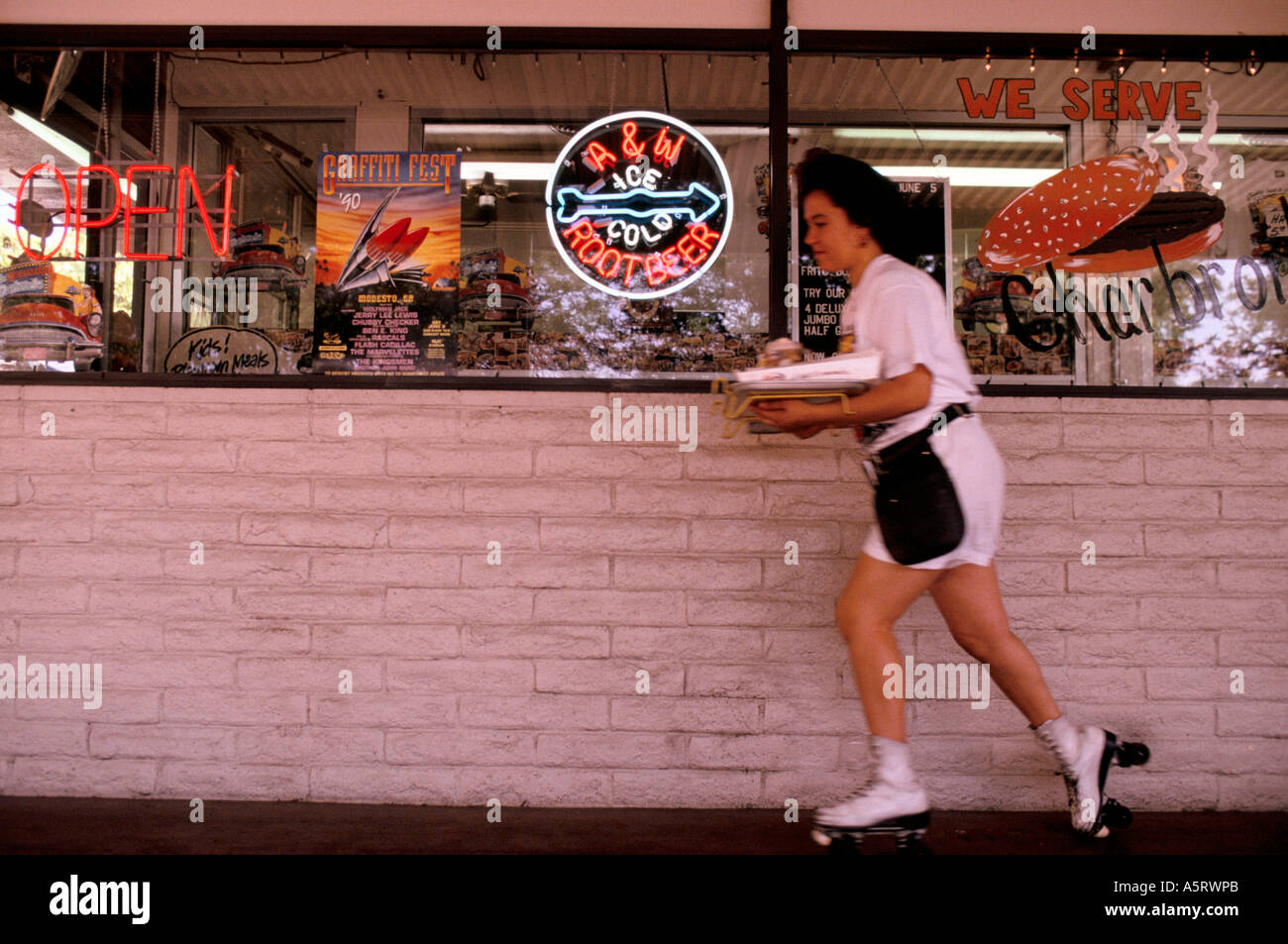 ROLLER SKATING WAITRESS AT A DRIVE IN RESTAURANT MODESTO Stock Photo ...