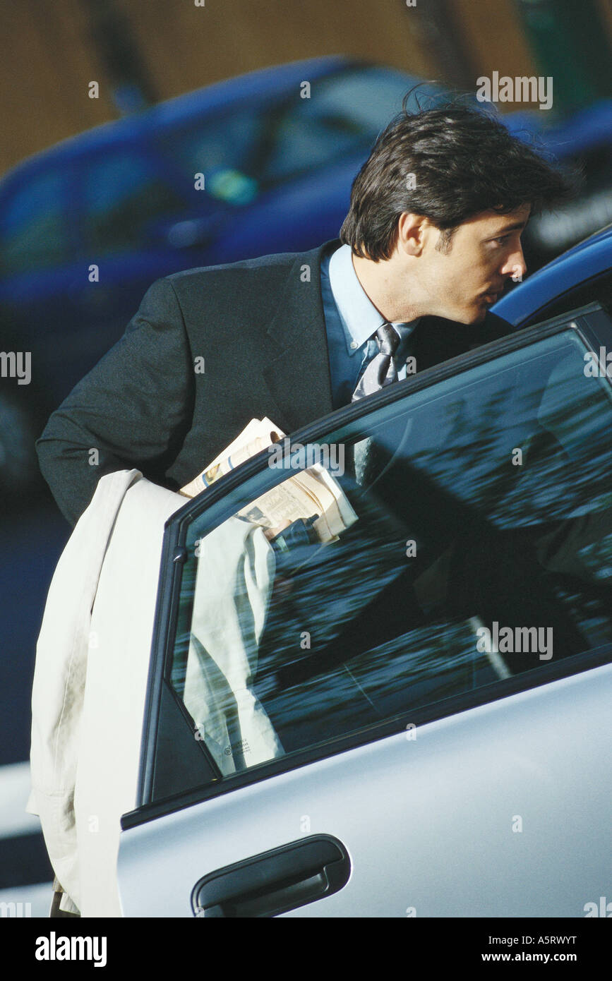 Men lean out open door hi-res stock photography and images - Alamy