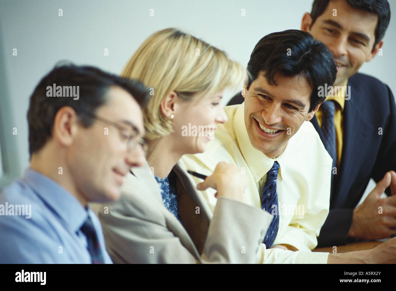 Business executives sitting together, laughing Stock Photo - Alamy