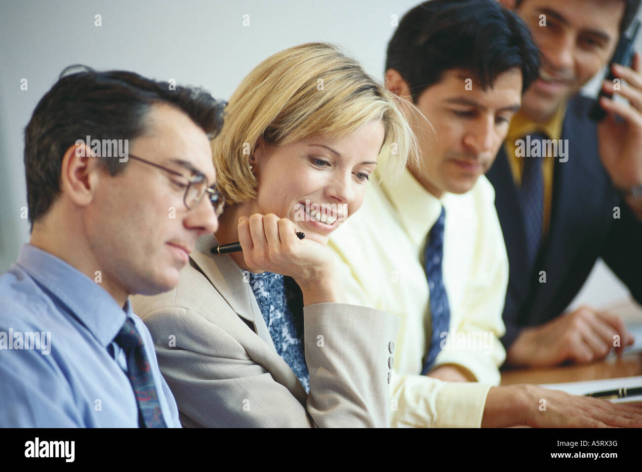 Business executives sitting together, laughing Stock Photo - Alamy
