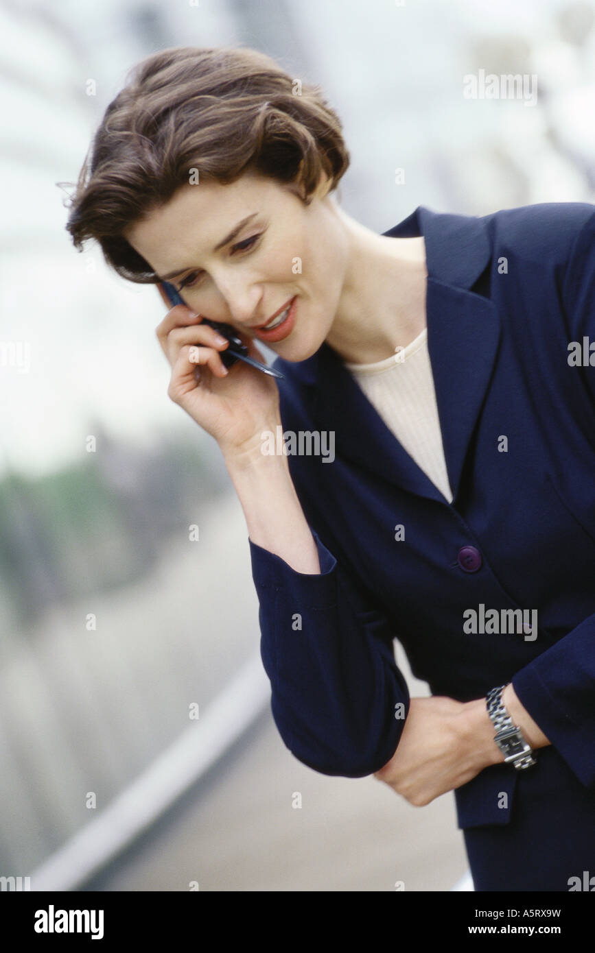 Businesswoman using cell phone Stock Photo - Alamy
