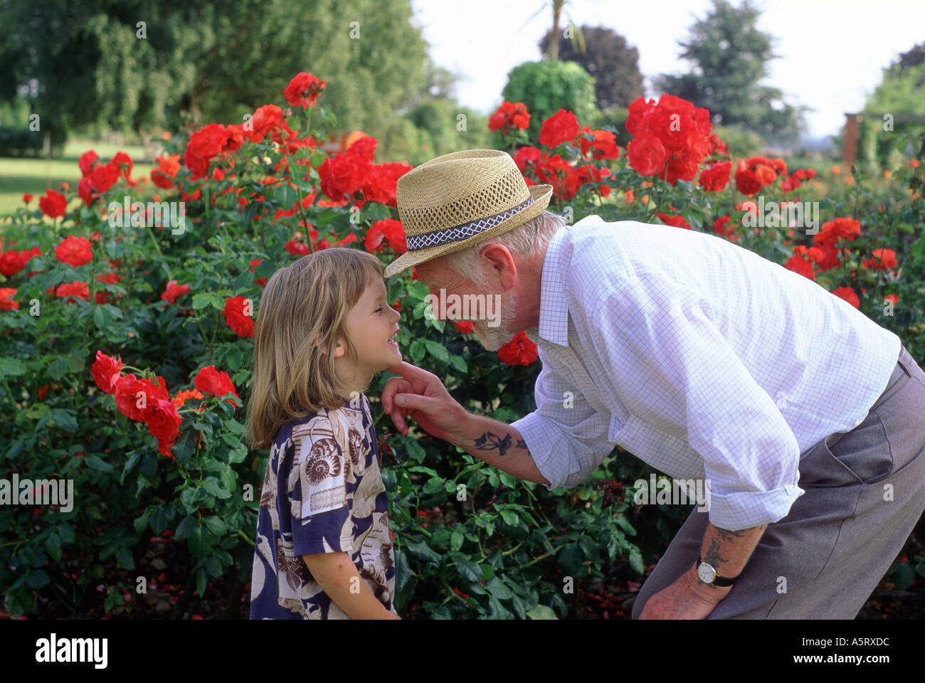 Child grandparent stoop hi-res stock photography and images - Alamy