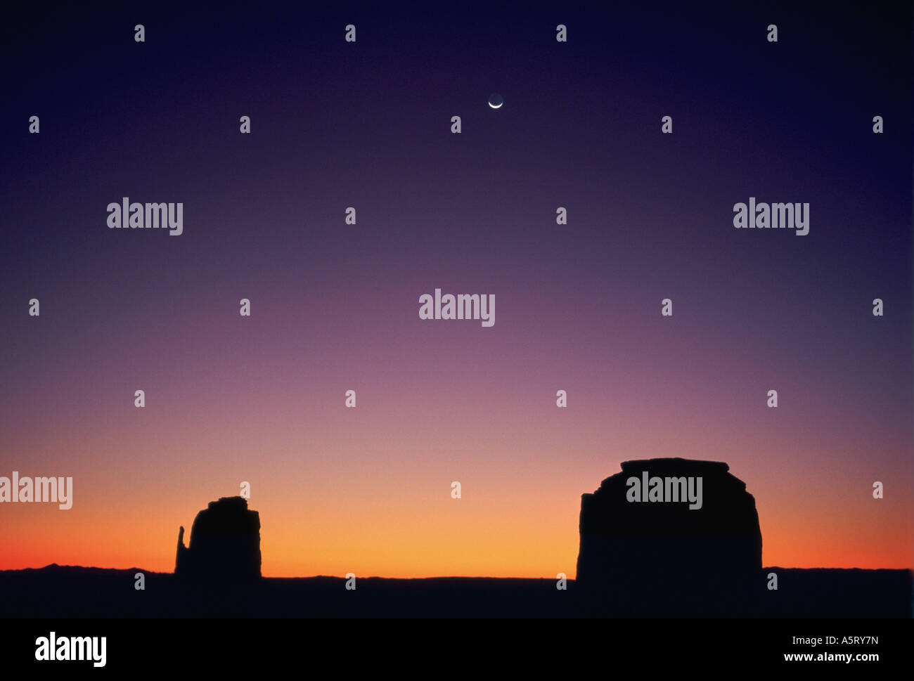 Crescent moon over Monument Valley Navajo Tribal Park Utah Stock Photo ...