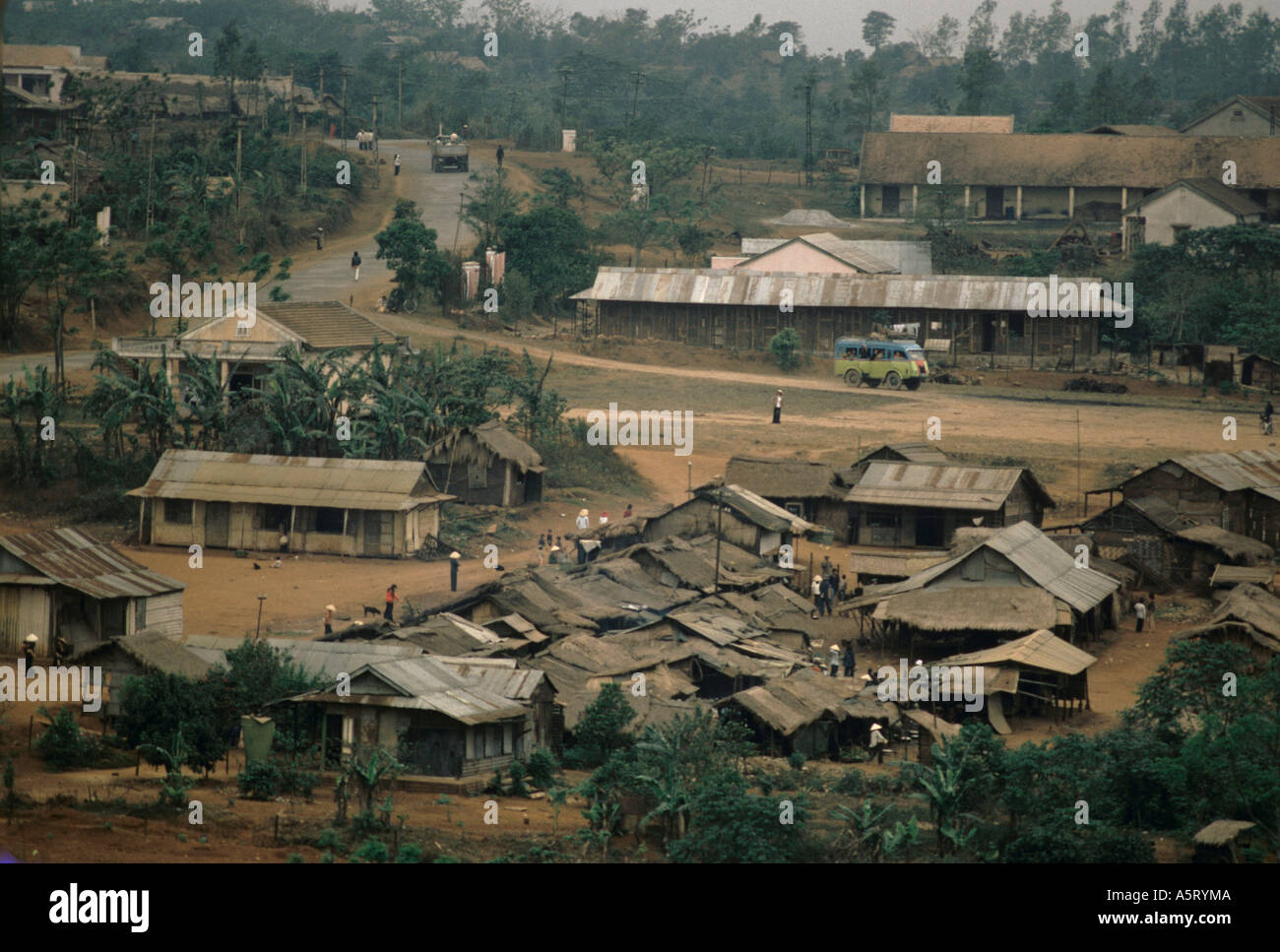 VIETNAM, FARM HUTS IN A RURAL VILLAGE SURROUNDED BY TREES Stock Photo ...