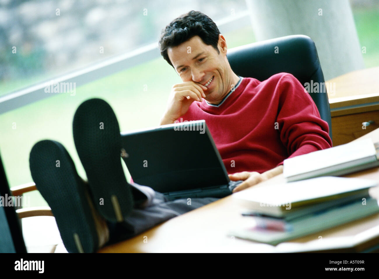 Man slumped over desk hi-res stock photography and images - Alamy