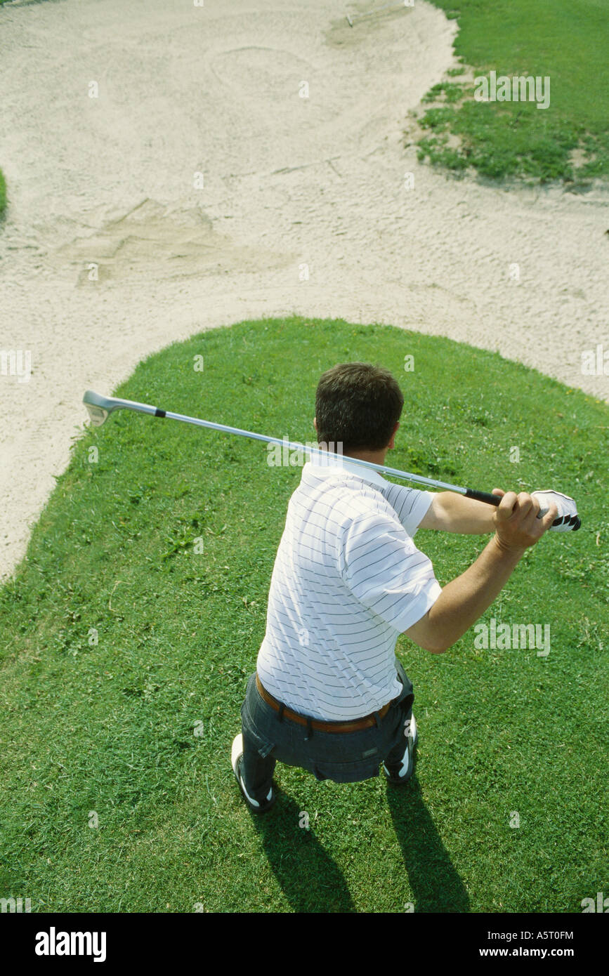 Golfer swinging, high angle view Stock Photo - Alamy