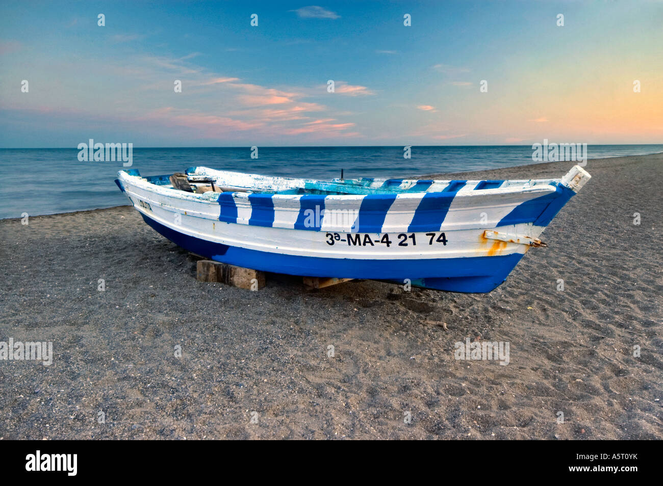 Boats on a beach Stock Photo - Alamy