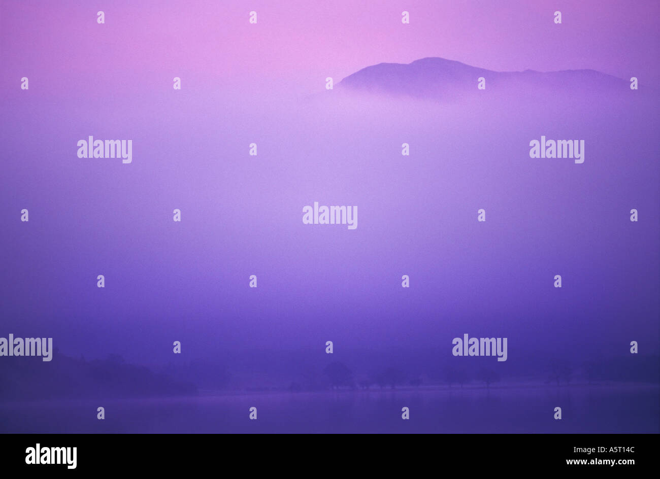 Misty sunset bassenthwaite lake lake district cumbria england UK GB EU ...