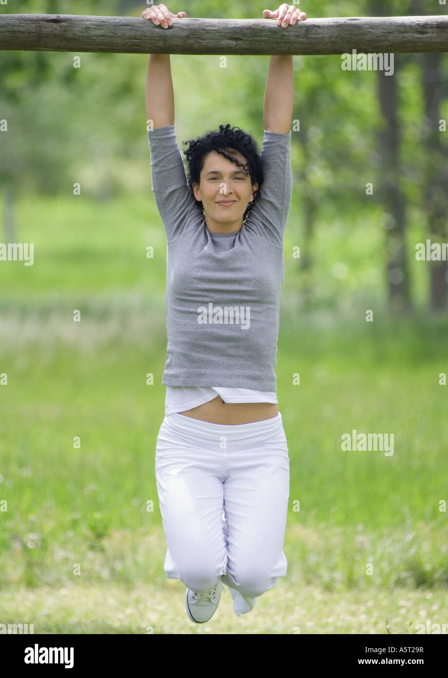 Woman gymnastics hang bar hi-res stock photography and images - Alamy