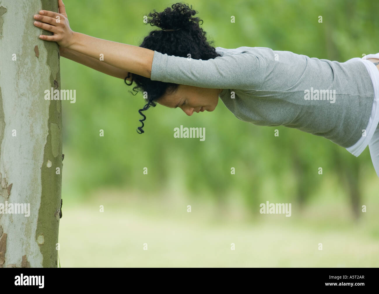 Woman Bending Over Head Down High Resolution Stock Photography and ...