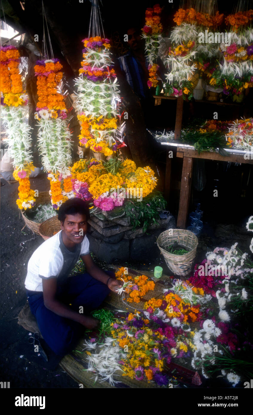 A flower seller lays out his stall in Mumbai Bombay India Stock Photo ...