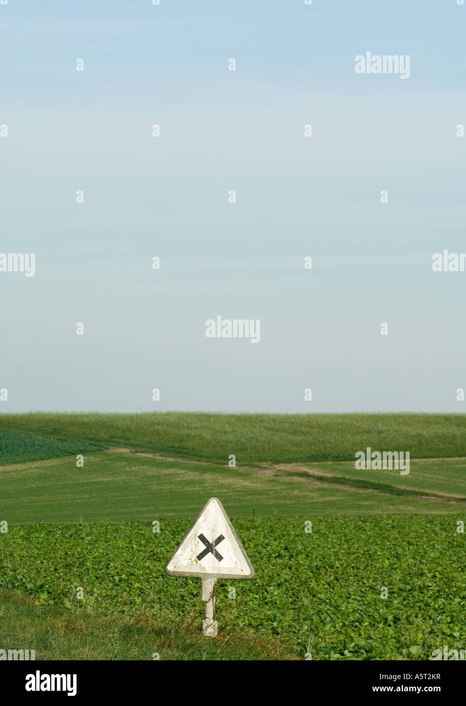 Warning sign and field of crops Stock Photo - Alamy