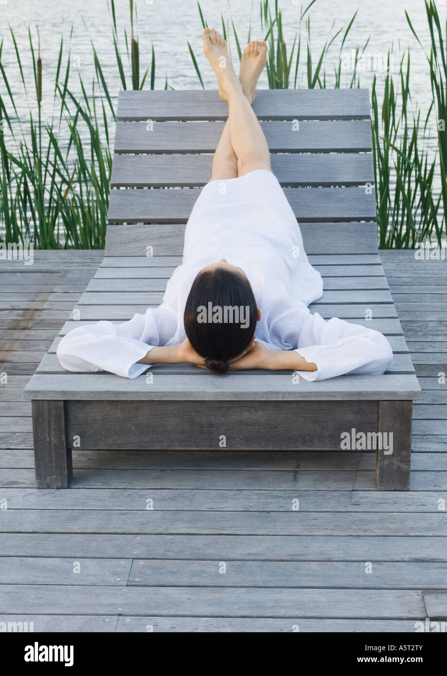 Woman Lying On Back Legs Up High Resolution Stock Photography and ...