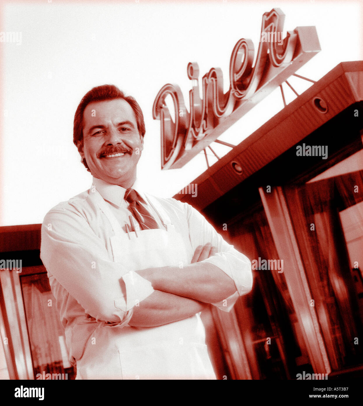 Ethnic looking Italian Middle Eastern etc diner owner or cook in front ...