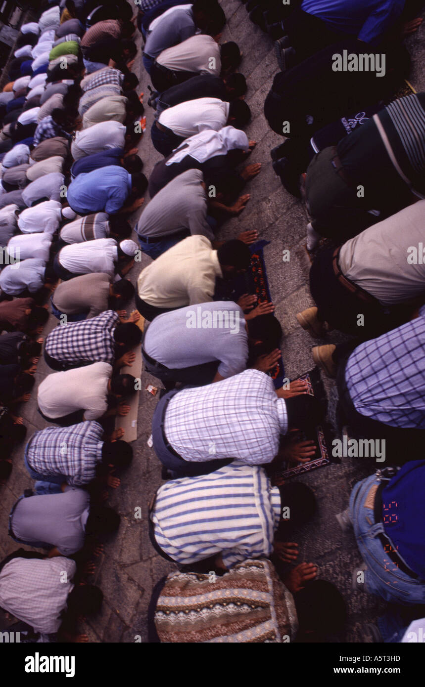 Muslim men bow in prayer at the old city East Jerusalem Israel Stock ...