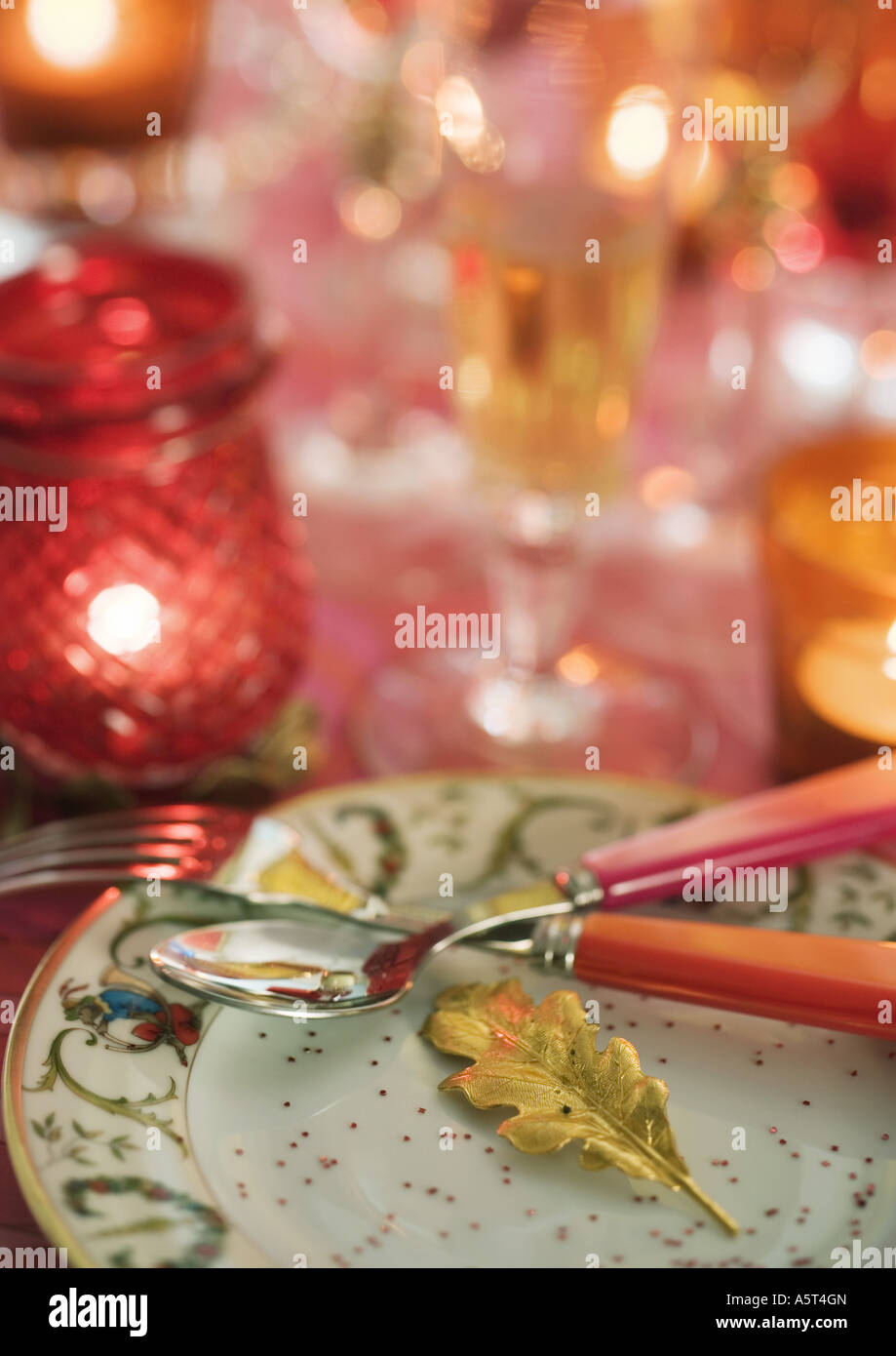Decorated table with place settings Stock Photo - Alamy
