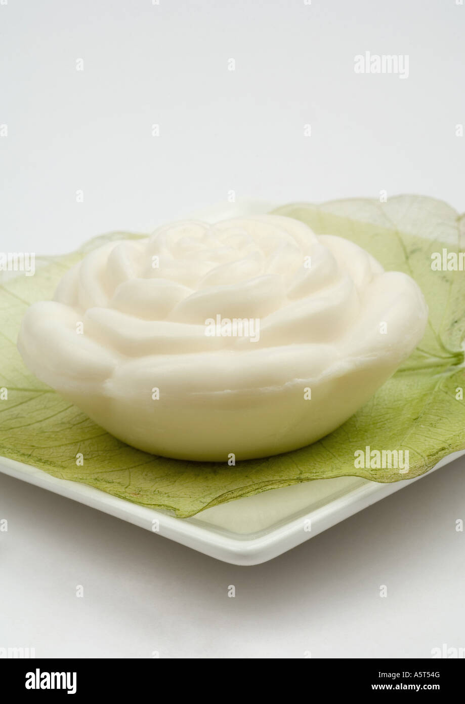 Rose-shaped soap and soapdish Stock Photo - Alamy