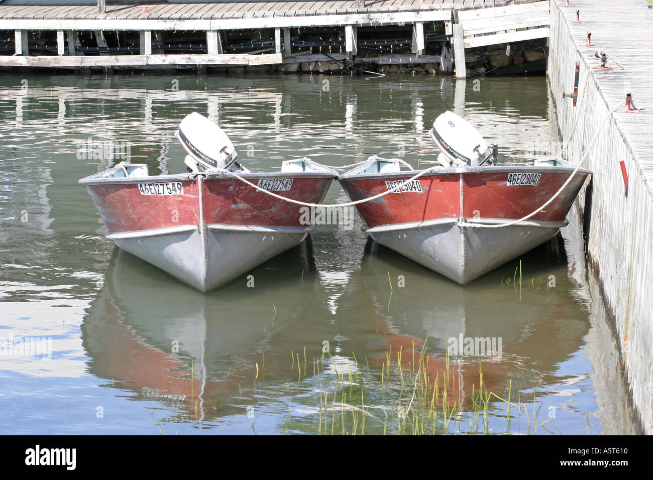 twin docked boats Stock Photo - Alamy