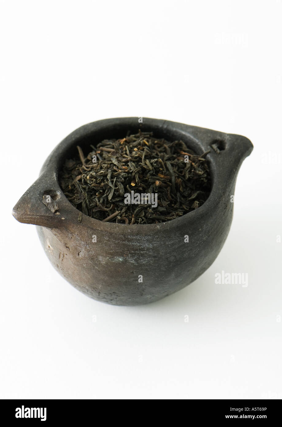 Bowl of tea leaves Stock Photo - Alamy
