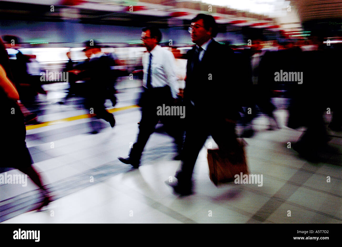 Commuters rush to work in Tokyo Japan Stock Photo - Alamy