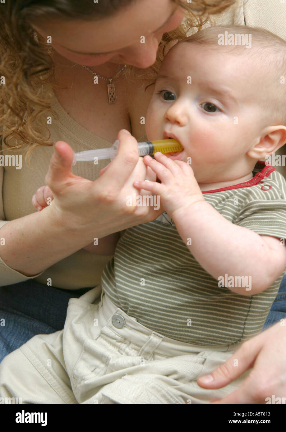Baby medicine oral syringe hi-res stock photography and images - Alamy