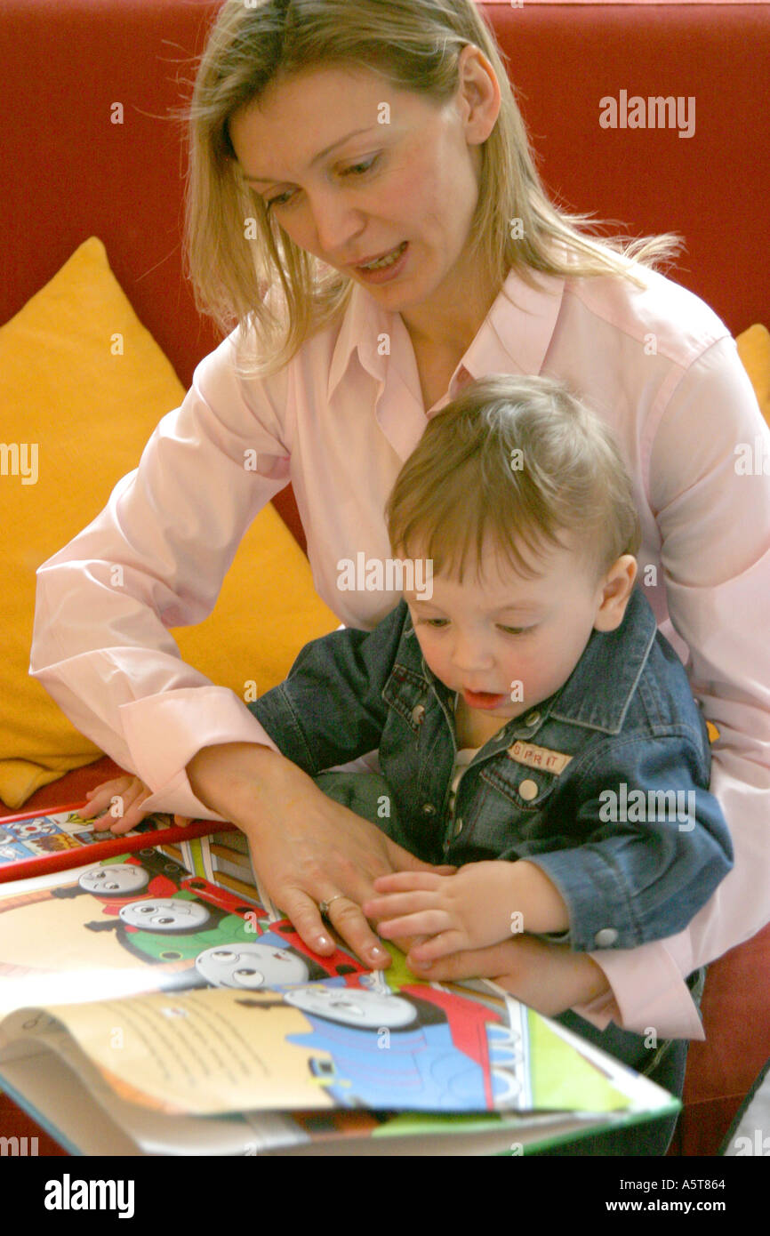mother reading book to son Stock Photo - Alamy