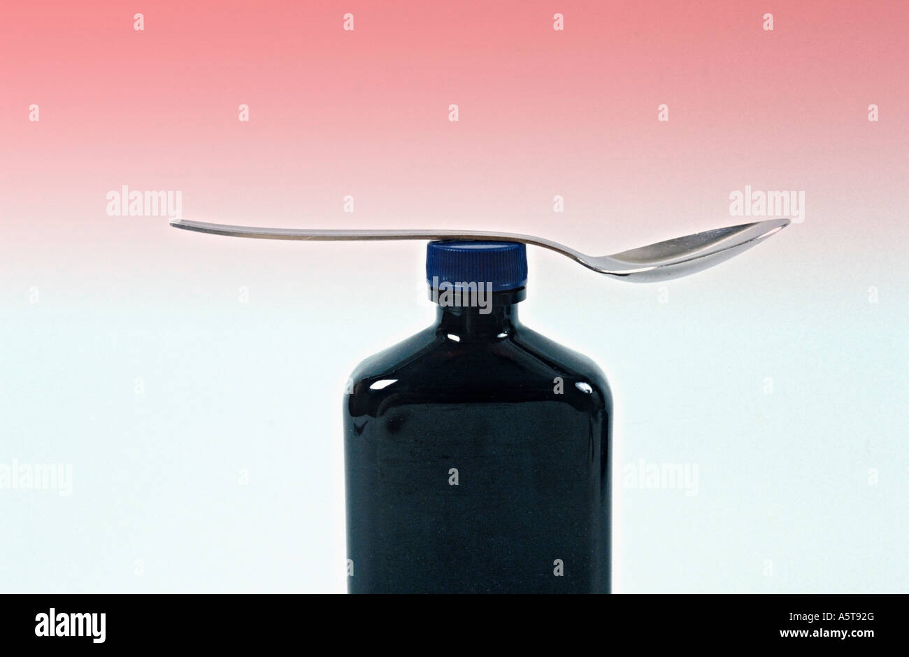 Cough Syrup and Spoon Stock Photo - Alamy