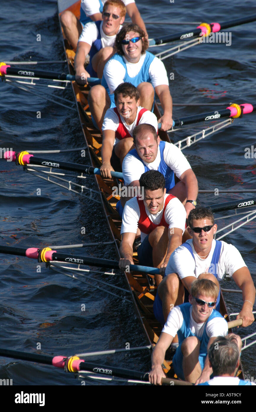 Junior rowing team rowing ahead during a boat race on the River Vltava ...