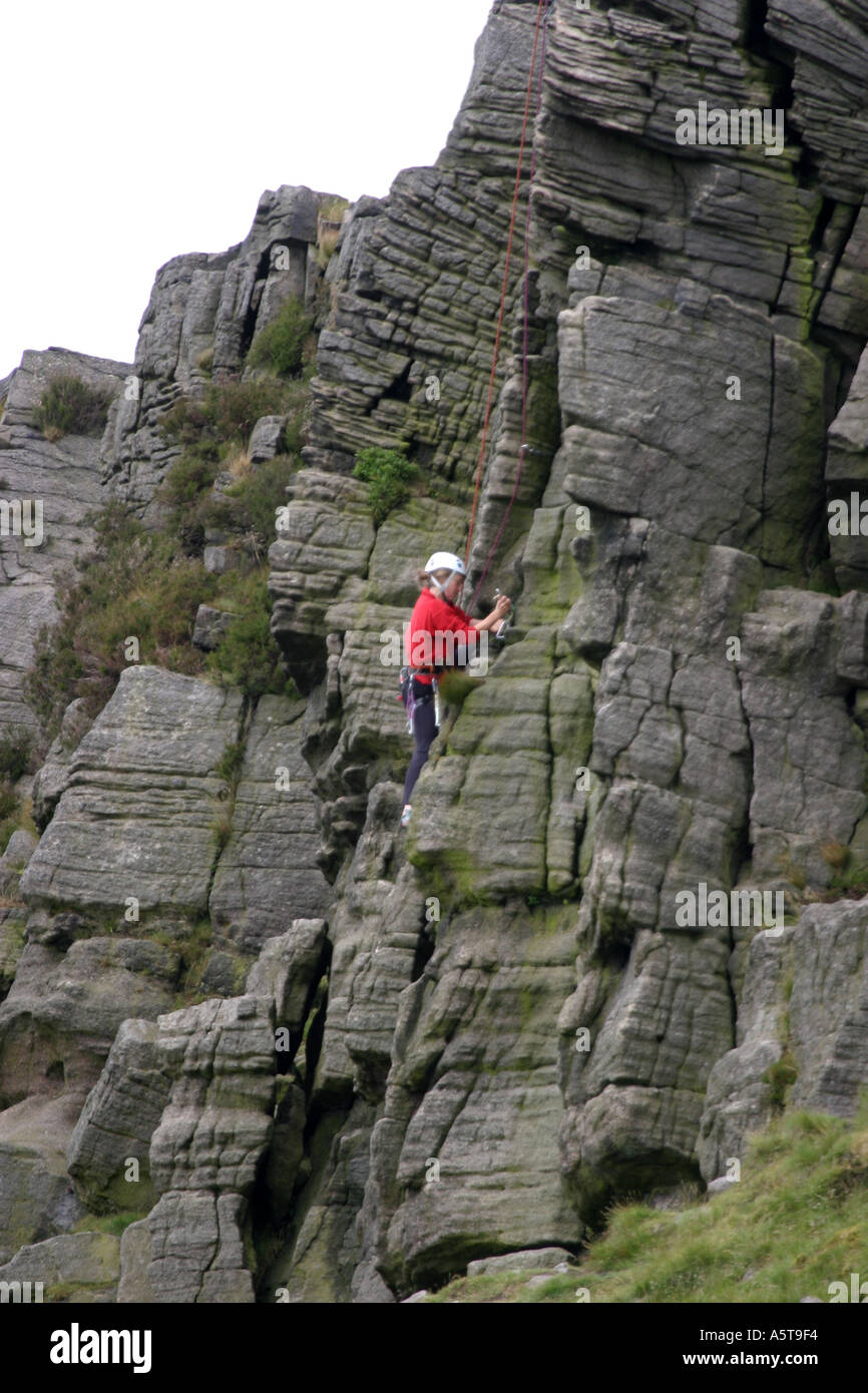 Climbers on Windgather rocks on the Eastern side of the Peak District ...