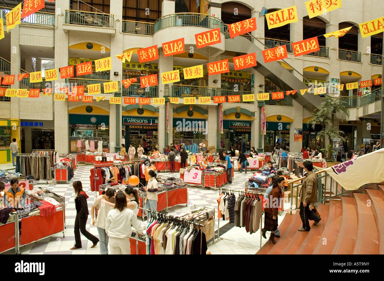 Banners advertising a sale inside a Chinese shopping mall, Shanghai ...