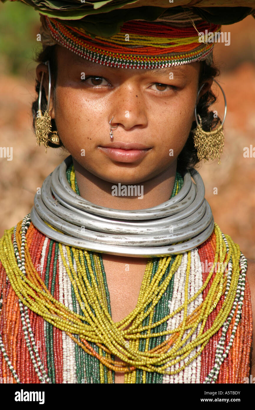 Young Bonda tribal girl wearing her traditional jewellry in Koraput ...
