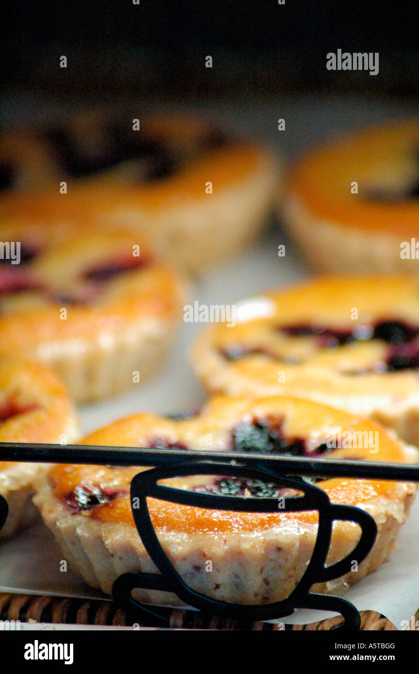 Pastries (tarts) on display in cafe Stock Photo - Alamy