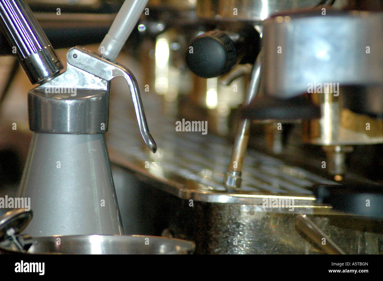 Espresso, cappucchino, coffee making machine. View from behind counter ...