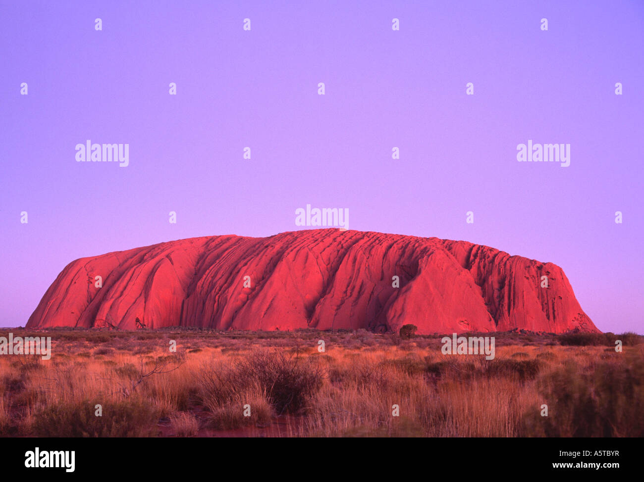 Glowing uluru sunset hi-res stock photography and images - Alamy