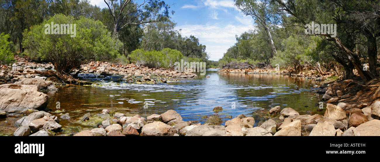 Panorama of the Avon river flowing through low water rapids in Walyunga ...