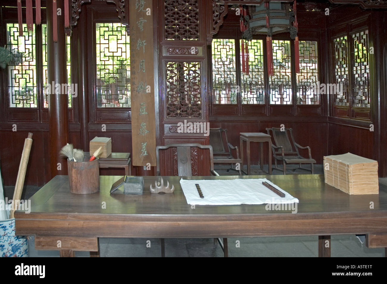 A peaceful working environment created by the rich rosewood paneling ...