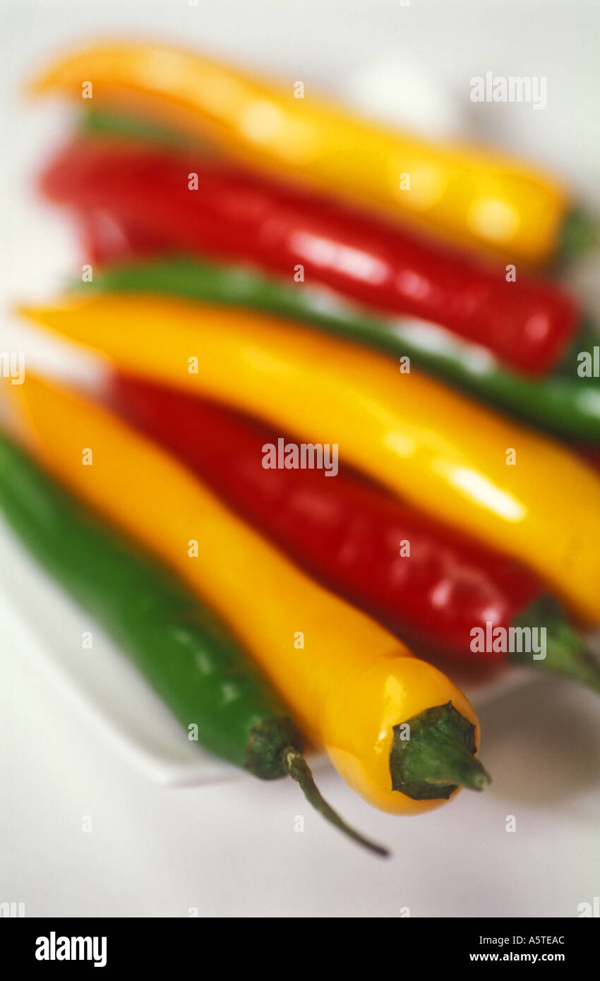red green yellow chilli peppers tri multi 3312 Stock Photo - Alamy